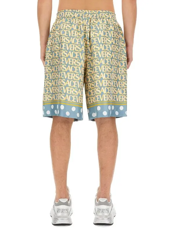 Versace Shorts With All-over Logo Print - Multicolor
