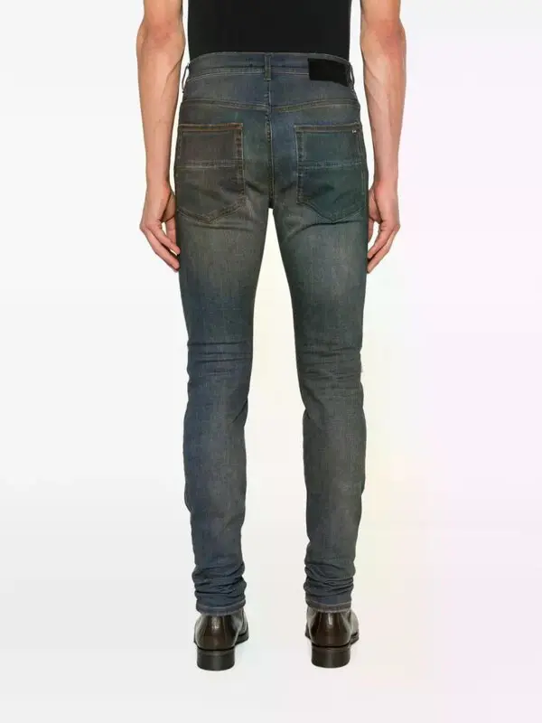Amiri Ultrasuede Mx1 Distressed Slim-fit Jeans