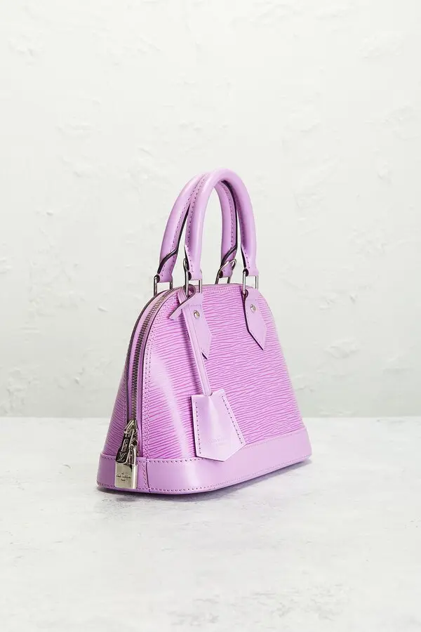 LOUIS VUITTON Epi Alma Bb Handbag In Purple