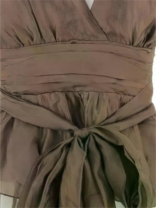 THE GARMENT Bow-detail Peplum Top