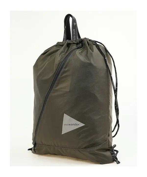 AND WANDER Drawstring Tote Bag