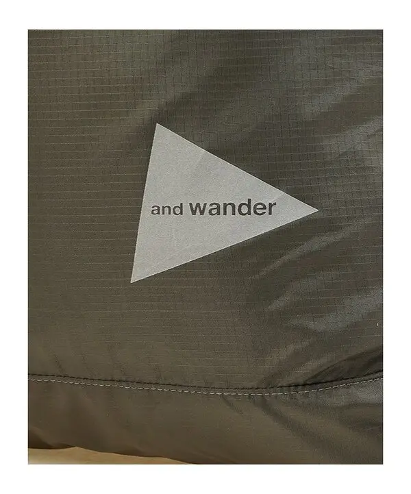 AND WANDER Drawstring Tote Bag