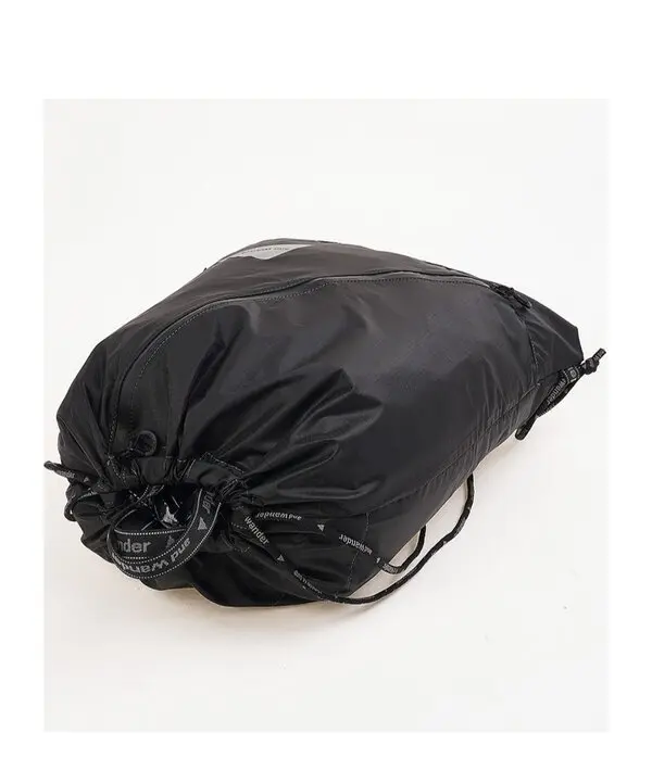 AND WANDER Drawstring Tote Bag