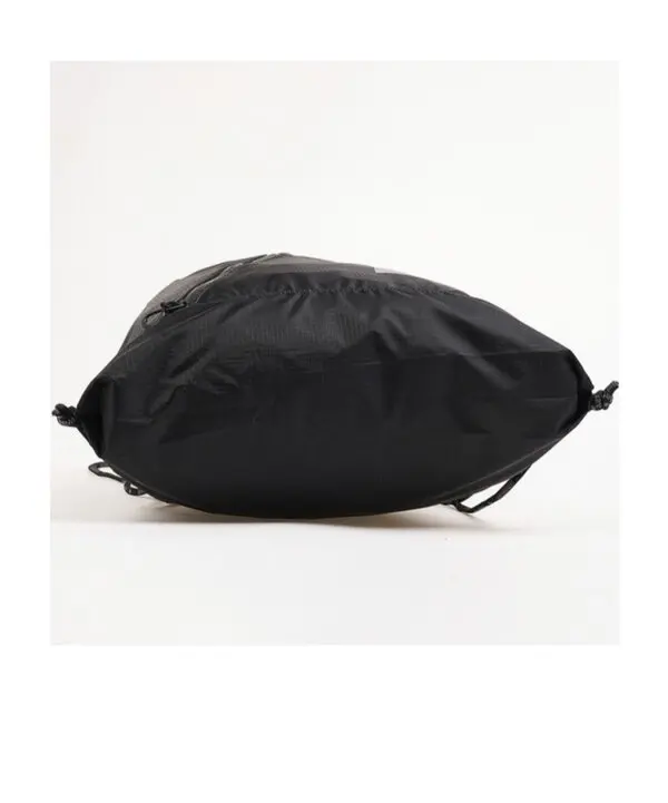 AND WANDER Drawstring Tote Bag