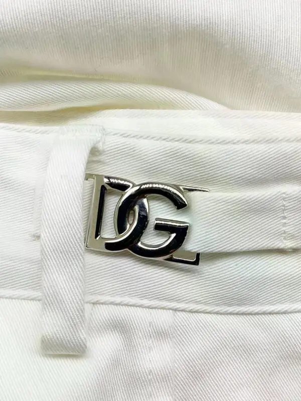 Dolce & Gabbana Cotton Twill Flared Trousers With Dg Logo Plaque