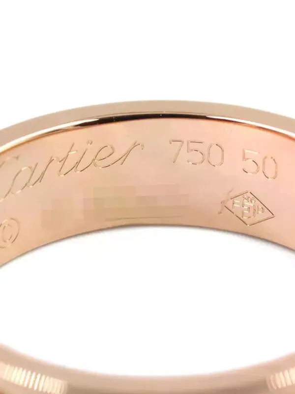 Cartier 18k Rose Gold Engraved Logo Band Ring