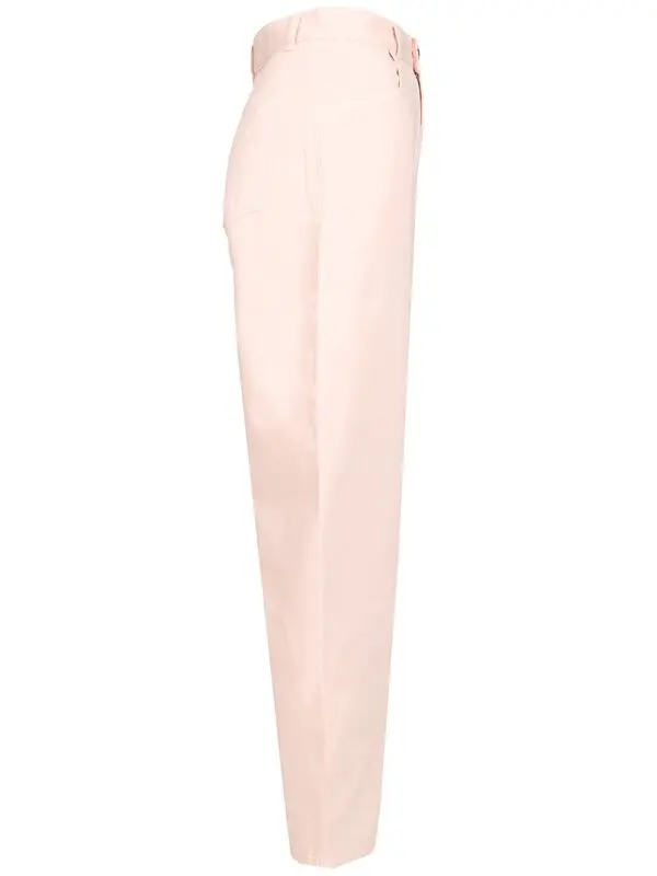 Alaïa Curved Dyed Denim Jeans