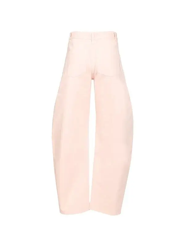 Alaïa Curved Dyed Denim Jeans