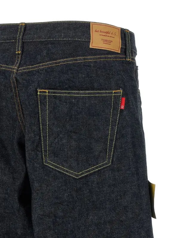 Undercover Belt-loop Jeans With Logo Patch