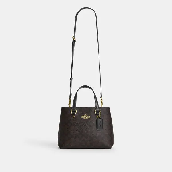 COACH OUTLET Station Carryall Bag In Signature Canvas - Gold/walnut/black