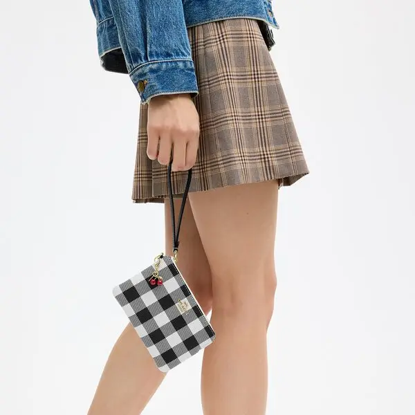 COACH OUTLET Corner Zip Wristlet With Gingham Print And Charm - Gold/black Multi