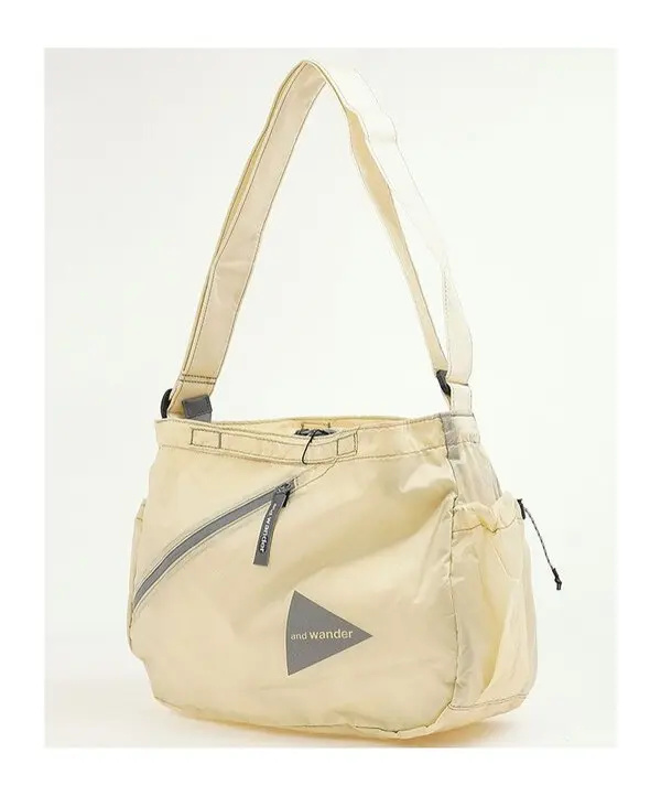 AND WANDER Logo Detail Shoulder Bag