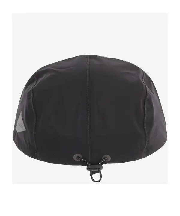 AND WANDER Drawstring Hat