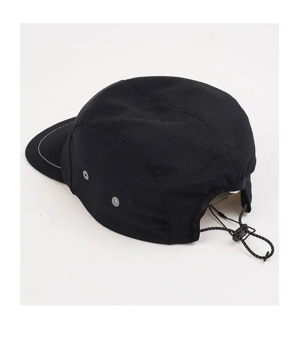 AND WANDER Logo Details On The Ventilated Hat