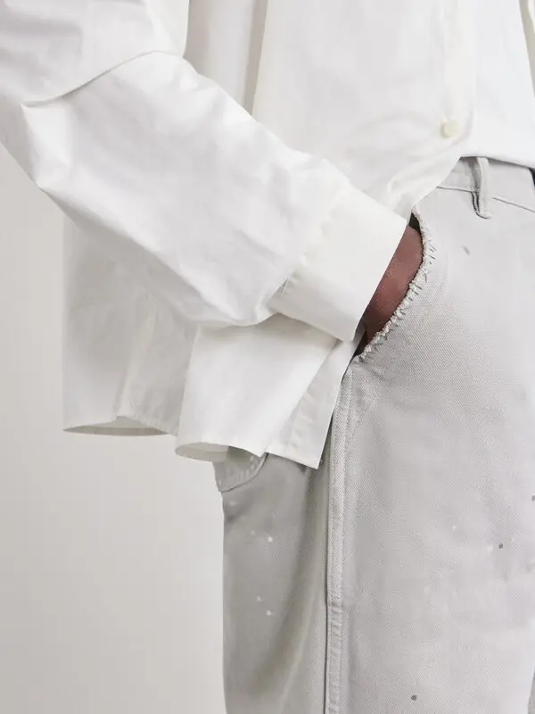 MAISON MARGIELA Wide-leg Paint-splattered Cotton-canvas Trousers