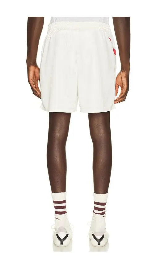 REPRESENT Printed Spike Football Shorts In White