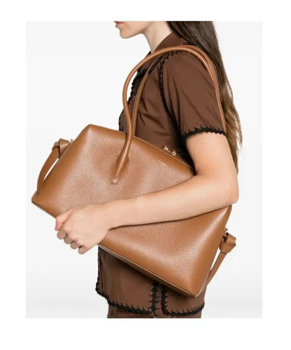 Yuzefi Brioche Duffle Grained-leather Shoulder Bag - Brown