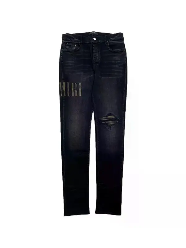 Amiri Logo-appliqué Distressed Jeans