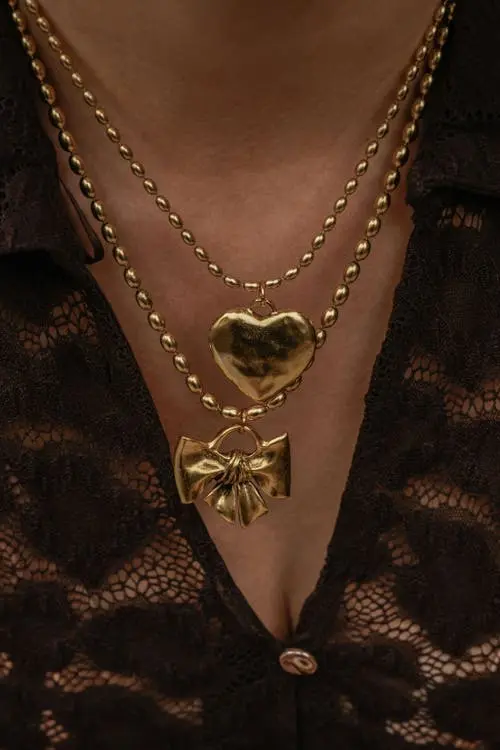 BEADS BY TARA Roxy Necklace Sculptural Bow Pendant In Antiqued