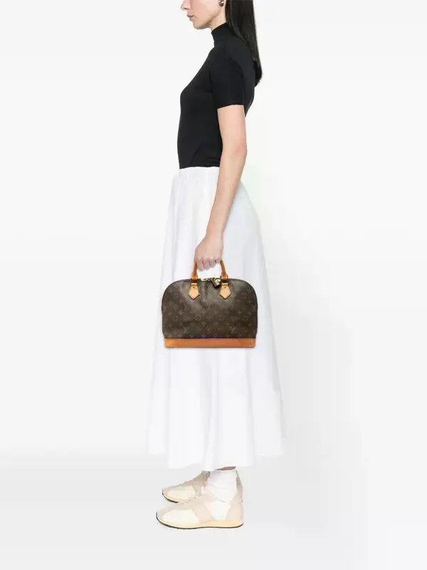 LOUIS VUITTON 1995 Monogram Alma Pm Handbag