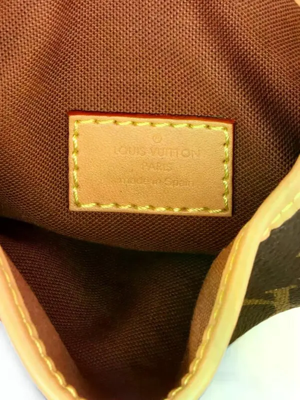 LOUIS VUITTON Fold Me Pouch Monogram Canvas Crossbody Bag