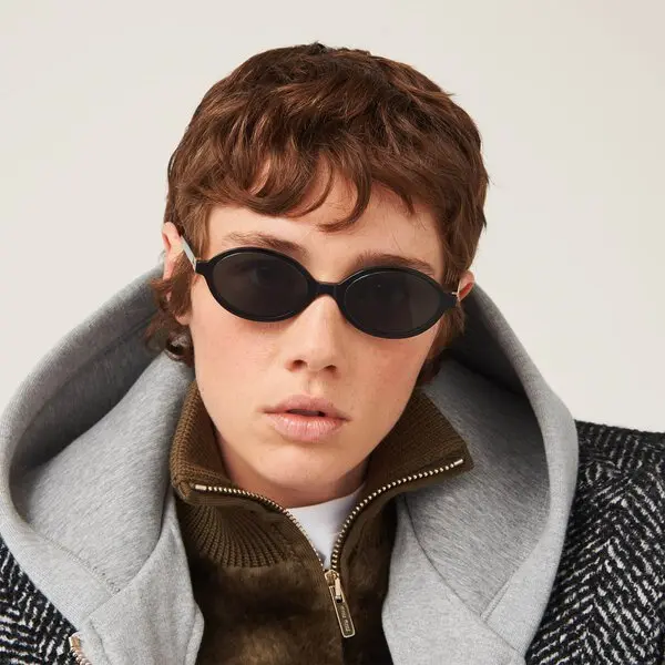 Miu Miu Oval Frame Sunglasses