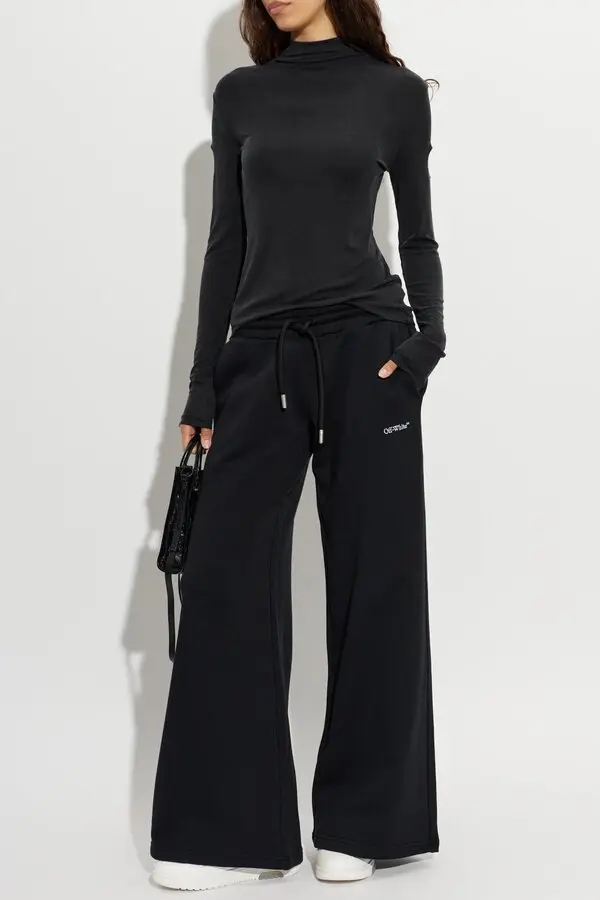 Off-White Ribbed Top With Decorative Cut-outs