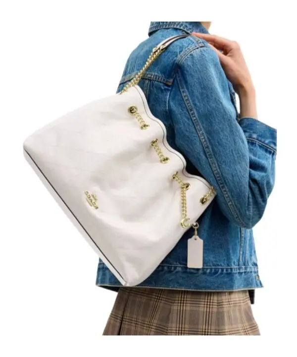 COACH Evelyn Shoulder Bag With Quilting And Charm