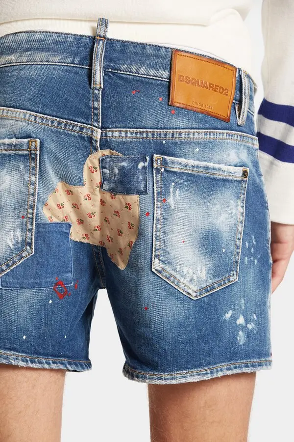 Dsquared2 Medium Wash Distressed Denim Shorts With Paint Splatter And Patch Detail