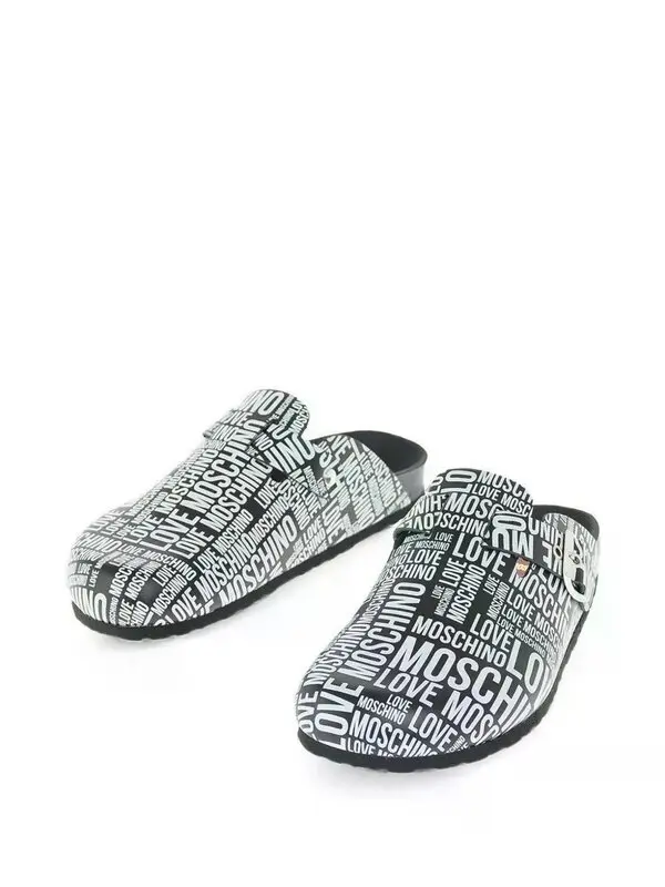 Moschino All-over Logo Print Buckle Sandals
