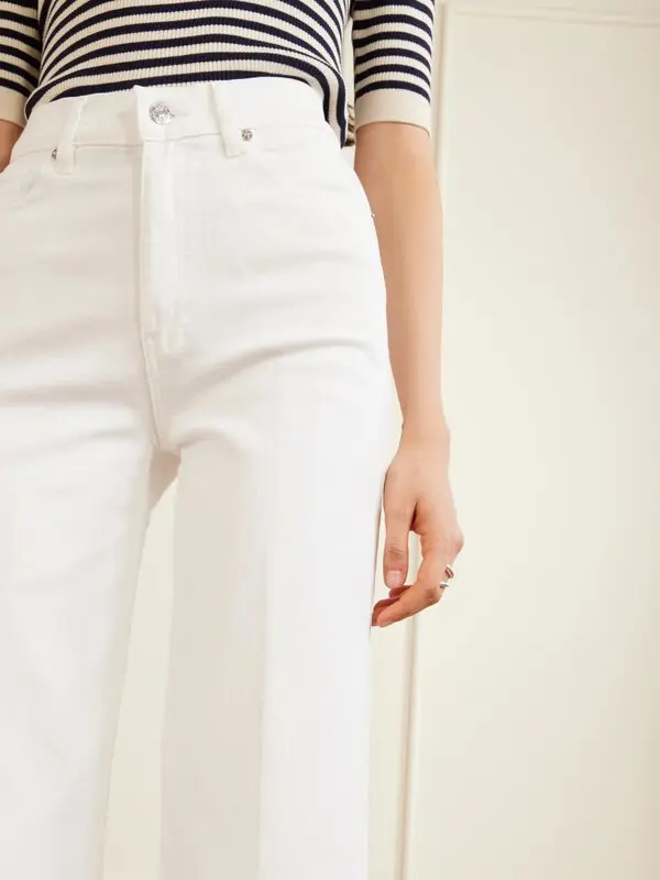 FRAME High Rise Wide Leg Jeans With Frayed Hem