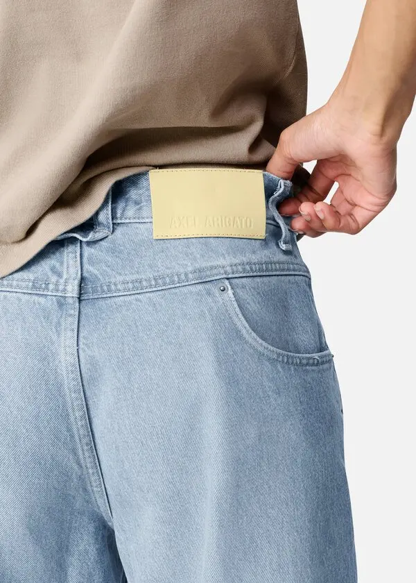 Axel Arigato Invert Relaxed Jeans In Light Wash Denim