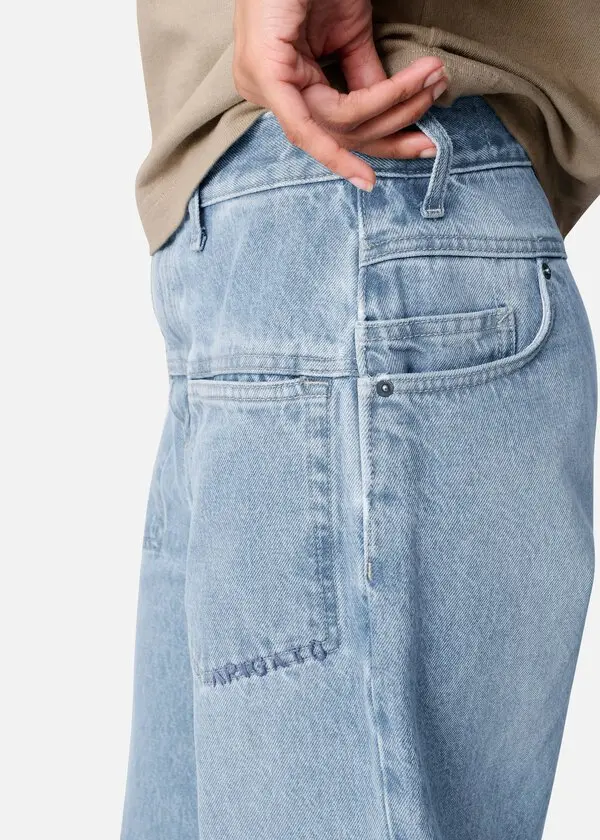 Axel Arigato Invert Relaxed Jeans In Light Wash Denim