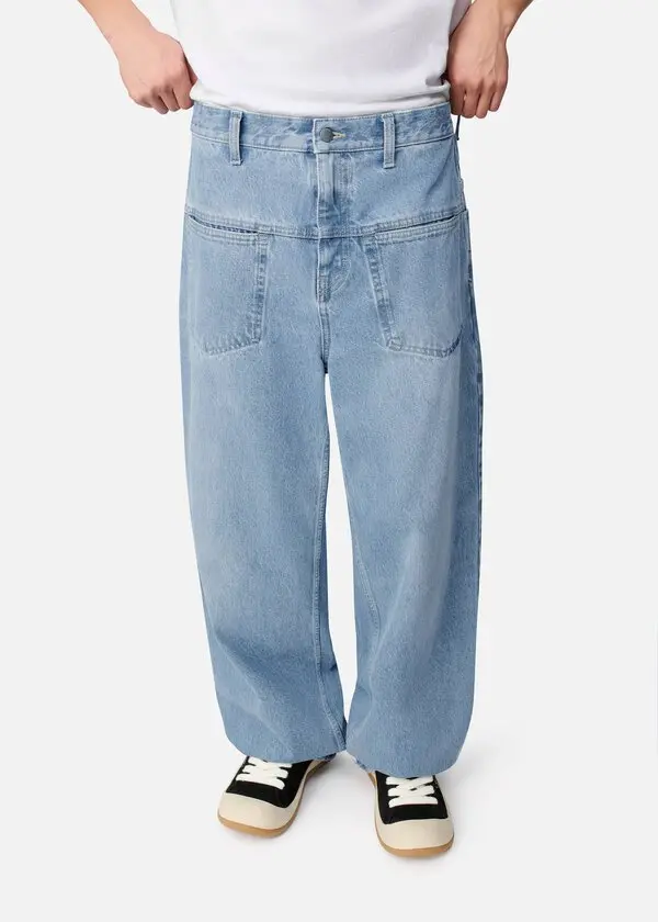 Axel Arigato Invert Relaxed Jeans In Light Wash Denim