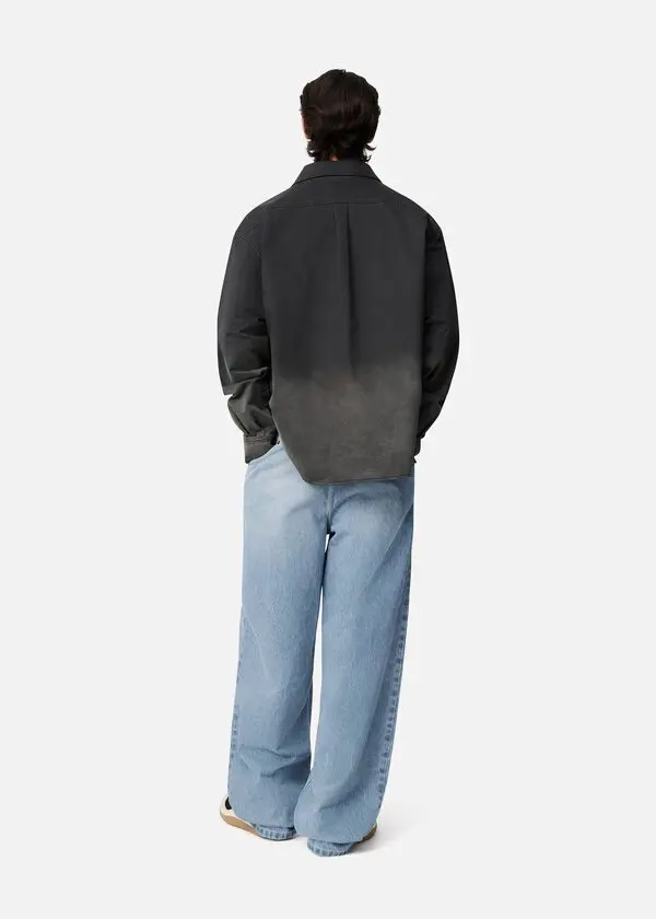 Axel Arigato Invert Relaxed Jeans In Light Wash Denim