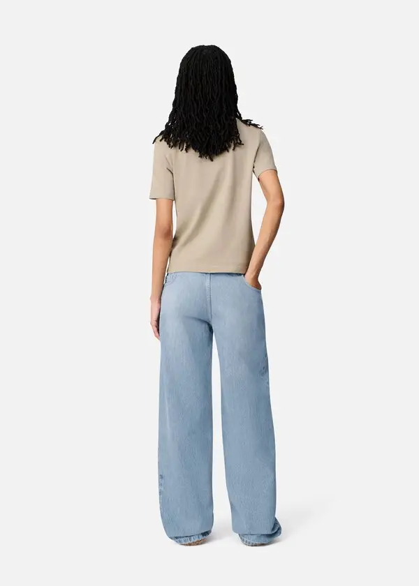 Axel Arigato Invert Relaxed Jeans In Light Wash Denim