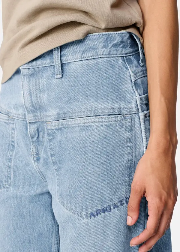 Axel Arigato Invert Relaxed Jeans In Light Wash Denim