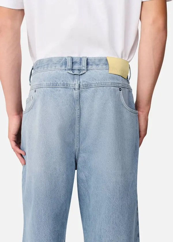 Axel Arigato Invert Relaxed Jeans In Light Wash Denim