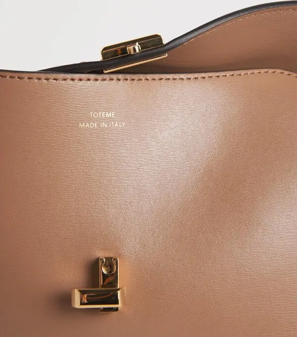 TOTEME T-lock Clutch Bag - Beige
