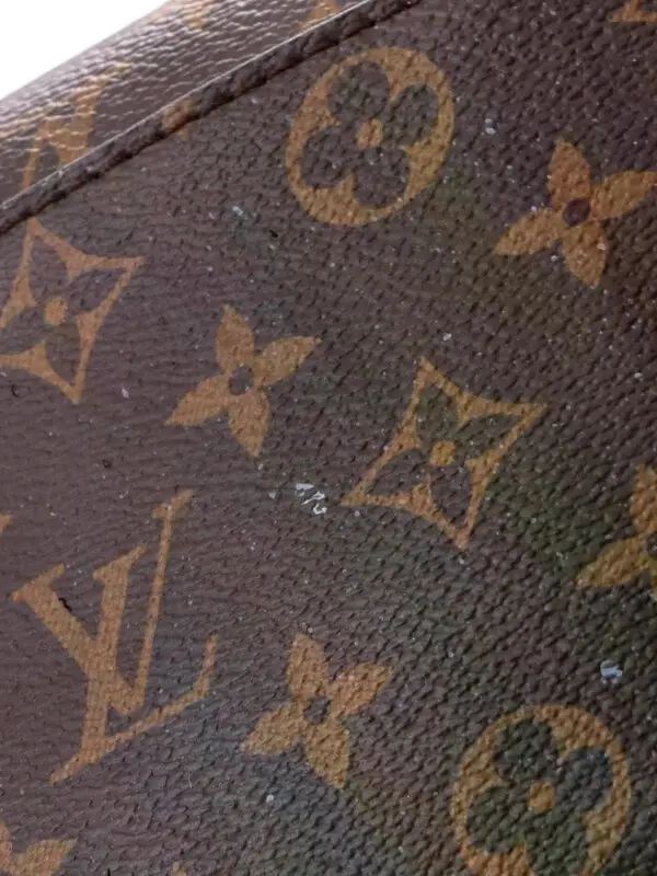 LOUIS VUITTON Monogram Canvas Lock Sling Bag
