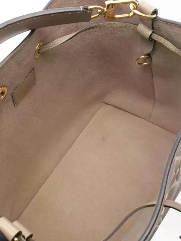 LOUIS VUITTON Monogram Giant Bicolor Empreinte Neonoe Mm Bucket Bag
