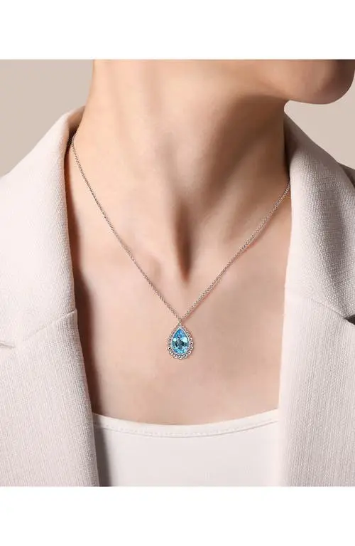 GABRIEL & CO. Pear-shaped Blue Topaz Pendant Necklace With Beaded Halo