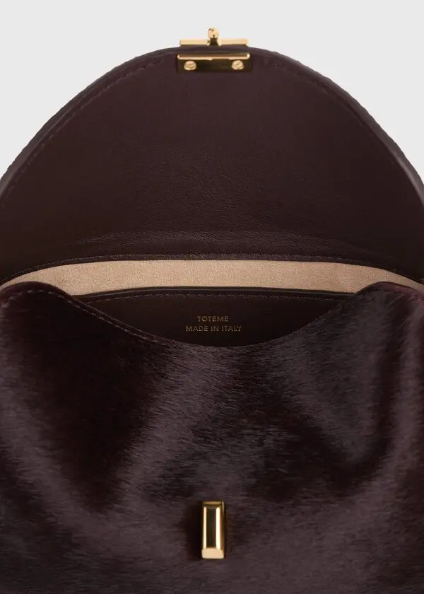 TOTEME Mini T-lock Pony Hair Clutch - Wine