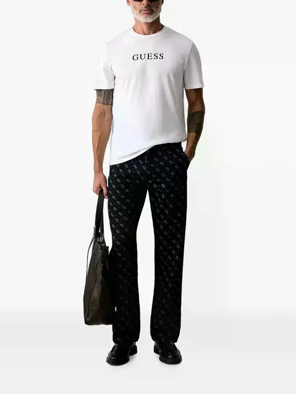Guess Damon Monogram-print Logo-patch Jeans - Blue