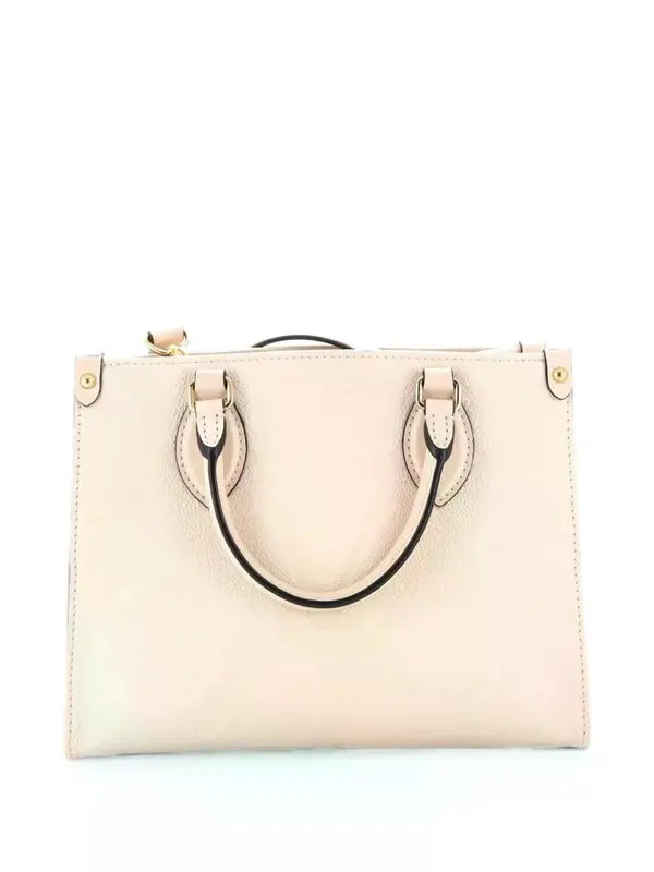 LOUIS VUITTON Onthego Pm Monogram Empreinte Giant Shoulder Bag - Neutrals
