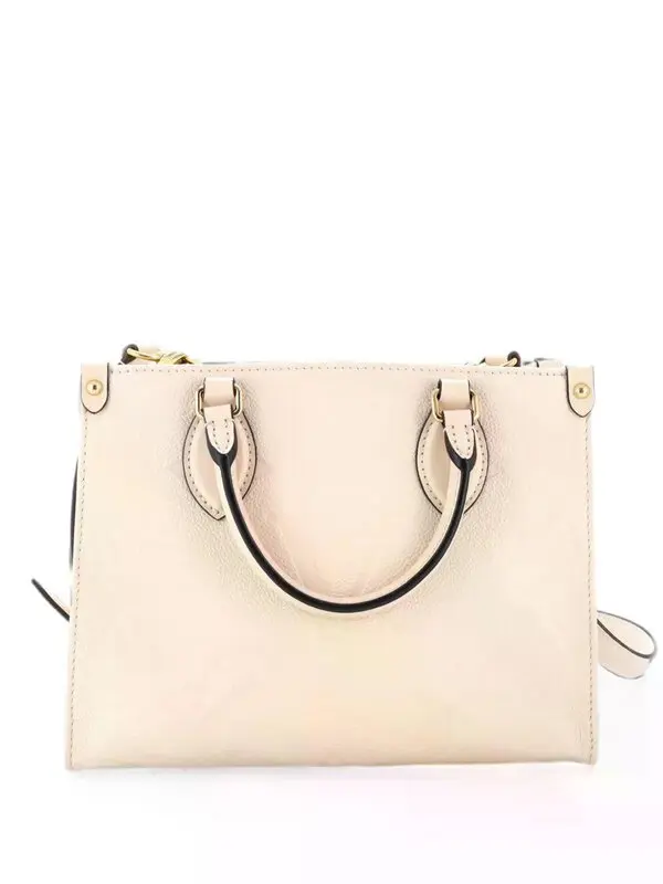 LOUIS VUITTON Onthego Pm Monogram Empreinte Giant Shoulder Bag - Neutrals