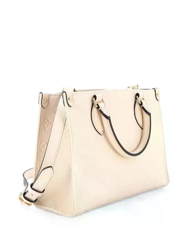 LOUIS VUITTON Onthego Pm Monogram Empreinte Giant Shoulder Bag - Neutrals