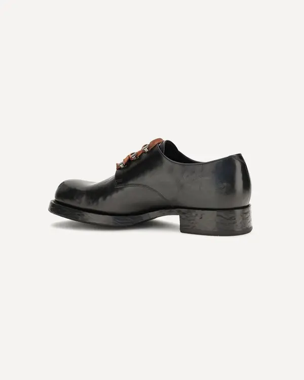 Prada Distressed Leather Lace-up Shoes