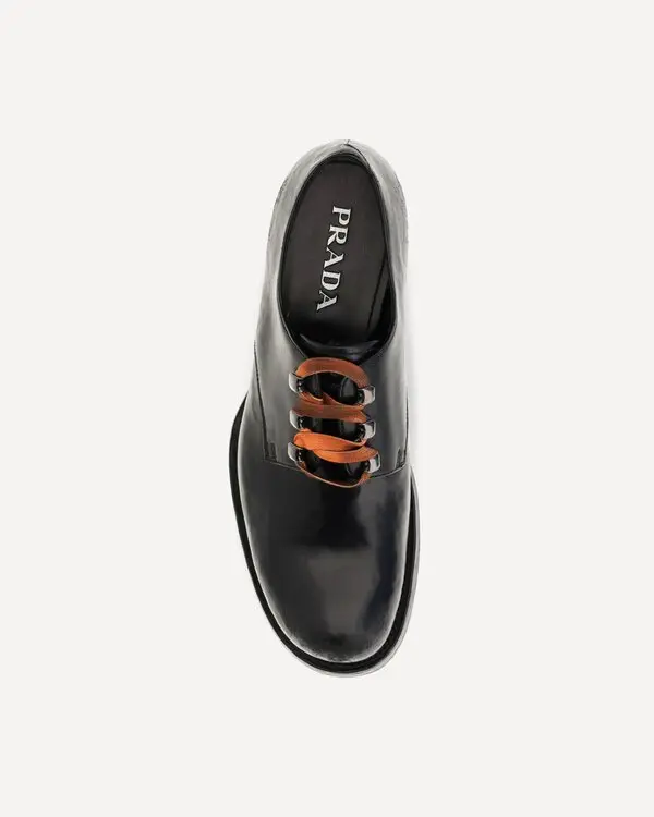 Prada Distressed Leather Lace-up Shoes