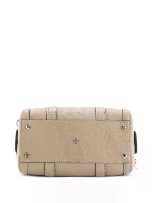 Gucci Jumbo Gg Embossed Leather Mini Travel Bag - Brown